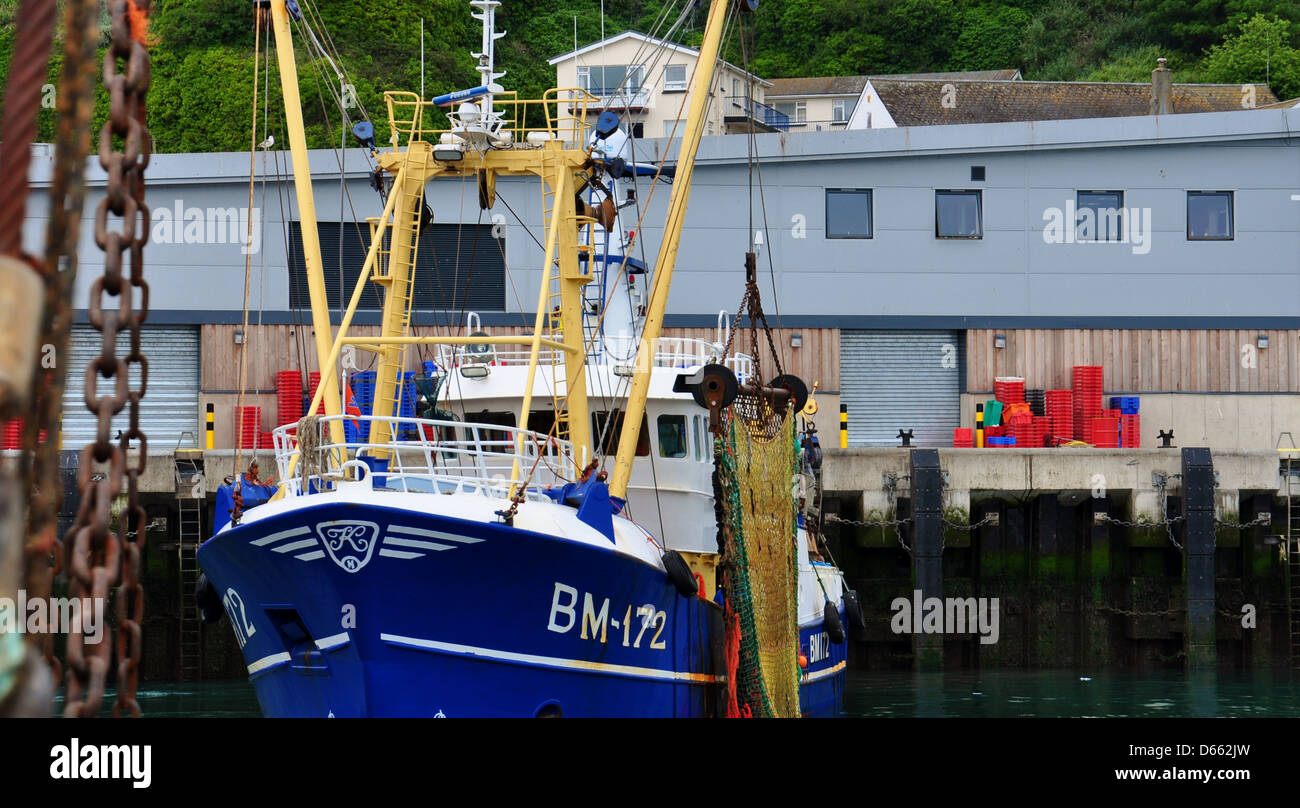 Trawler getting ready to sail Stock Photo - Alamy