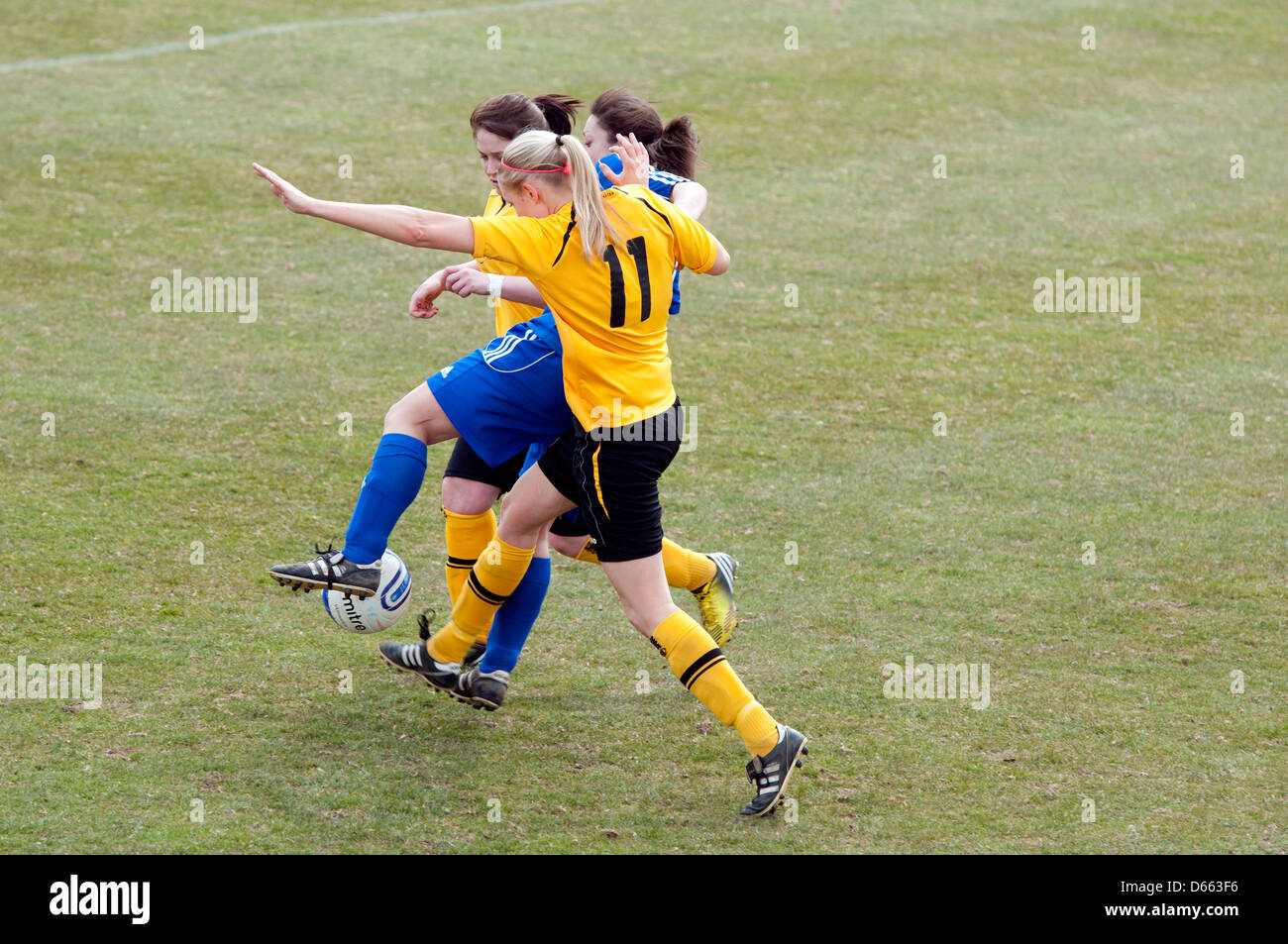 Football action ladies hi-res stock photography and images - Alamy