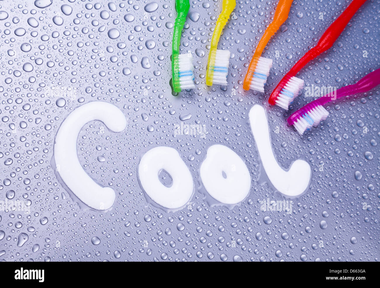 cool and clean concept with colorful toothbrushes Stock Photo - Alamy