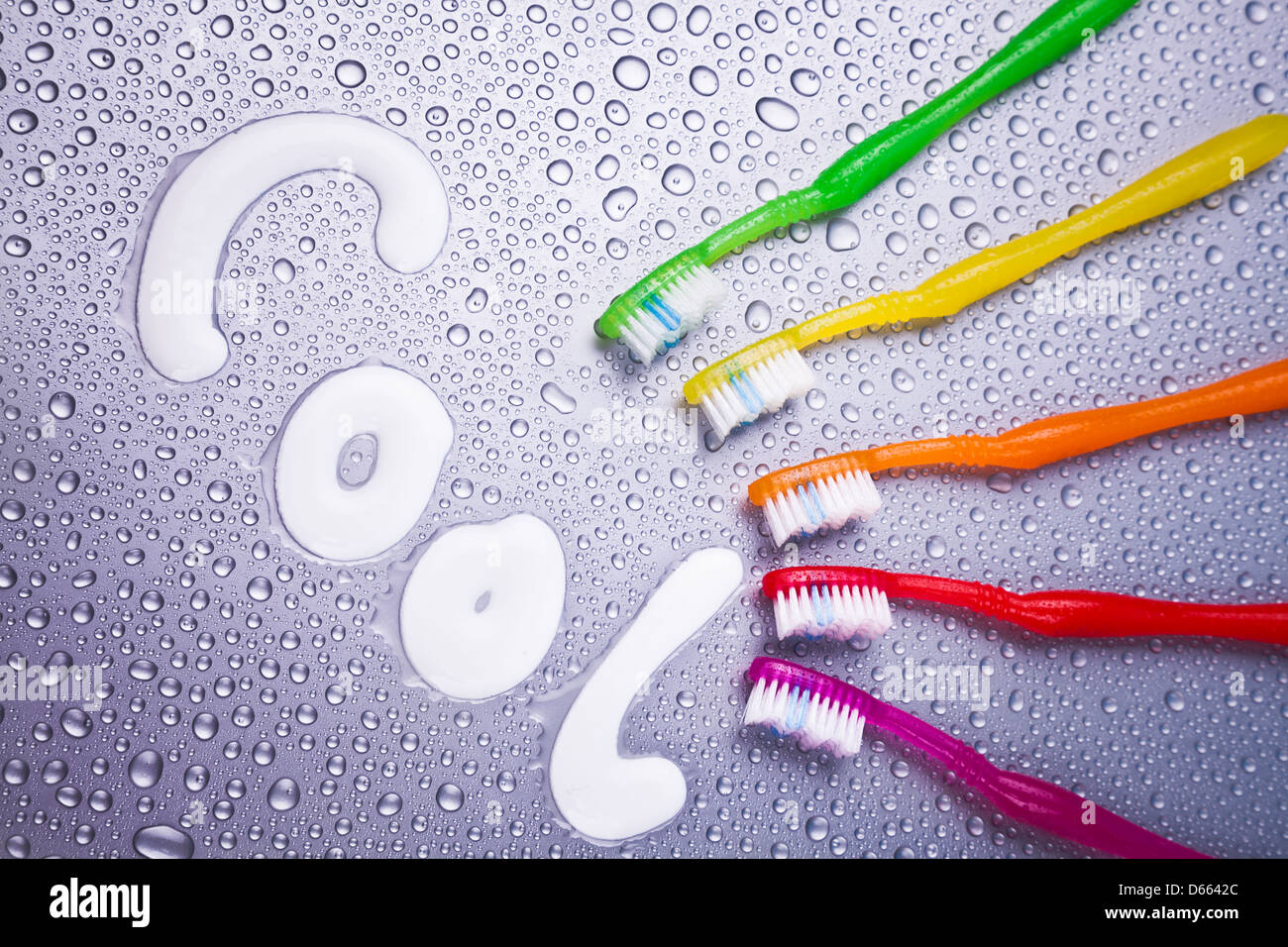 cool and clean concept with colorful toothbrushes Stock Photo - Alamy