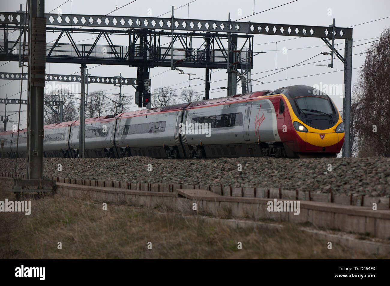 A Virgin train passing along the West Coast Main Line railway Stock ...