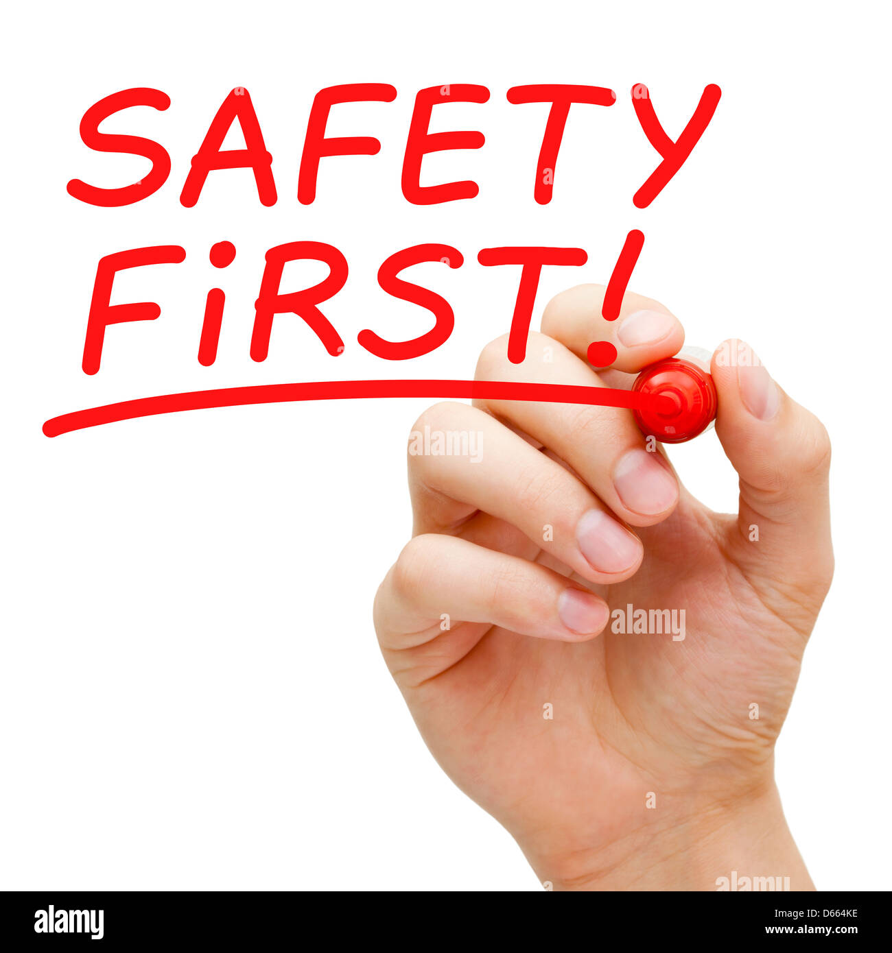 Hand writing Safety First with red marker on transparent wipe board ...