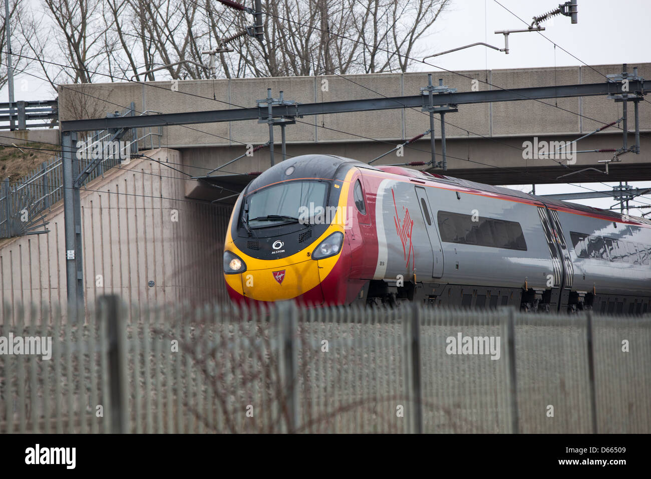 A Virgin train passing along the West Coast Main Line railway Stock ...