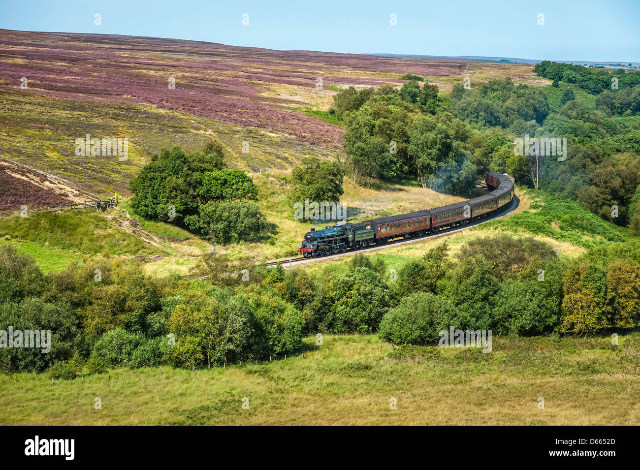 Vintage steam train in the North York Moors National Park in summer ...