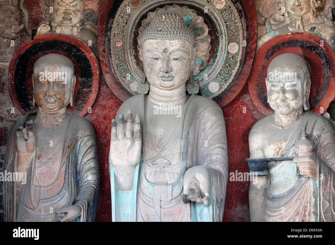 Ancient Buddha statue in caves in Guangyuan, Sichuan, China Stock Photo ...