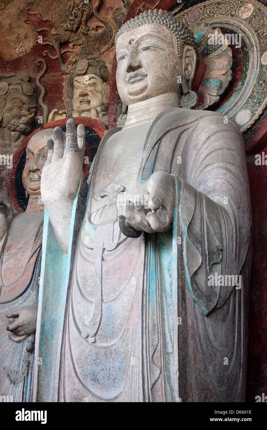 Ancient Buddha statue in caves in Guangyuan, Sichuan, China Stock Photo ...