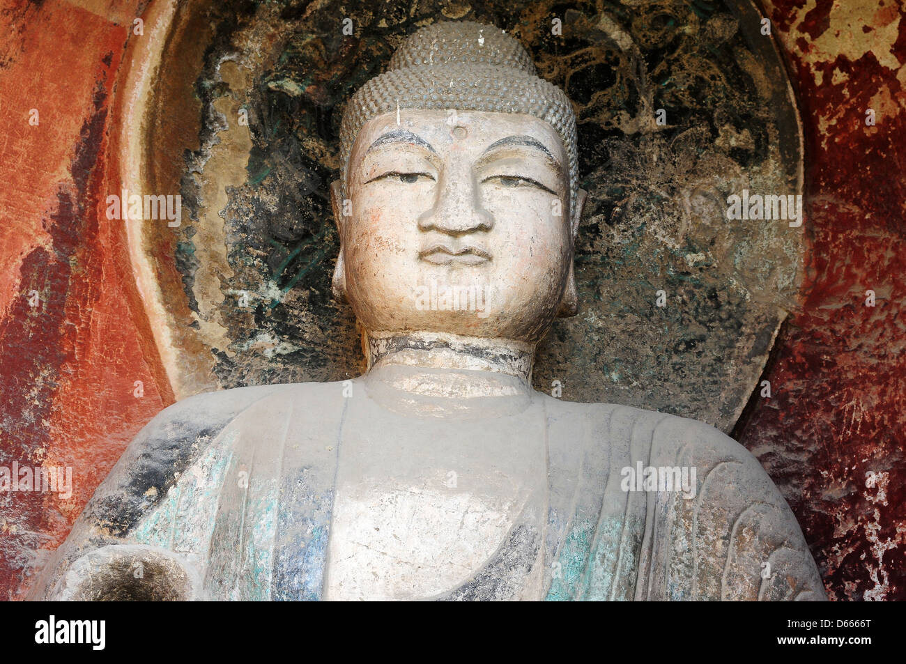 Ancient Buddha statue in caves in Guangyuan, Sichuan, China Stock Photo ...