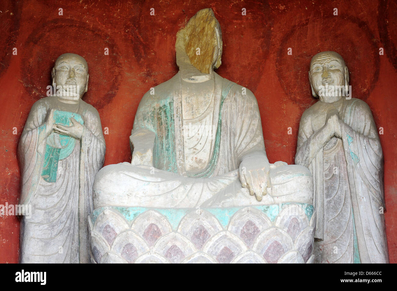 Ancient Buddha statue in caves in Guangyuan, Sichuan, China Stock Photo ...