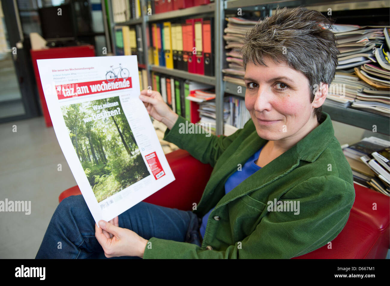 Editor-in-chief of daily newspaper taz, Ines Pohl, holds the front page ...