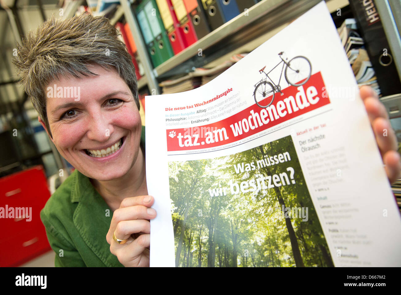 Editor-in-chief of daily newspaper taz, Ines Pohl, holds the front page ...