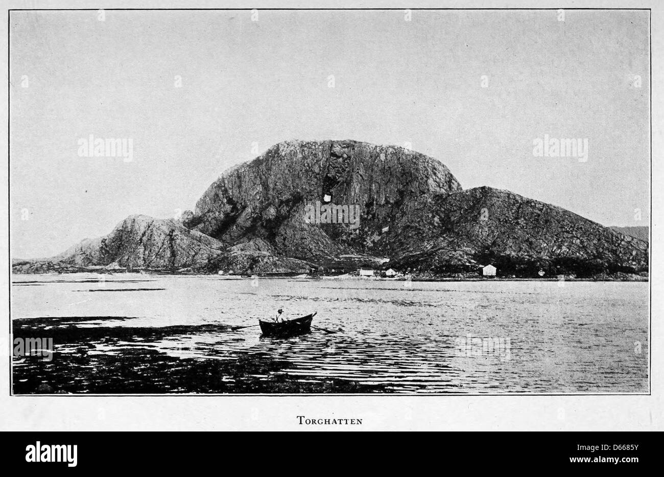 This 1922 photograph highlights the striking Torghatten mountain in ...