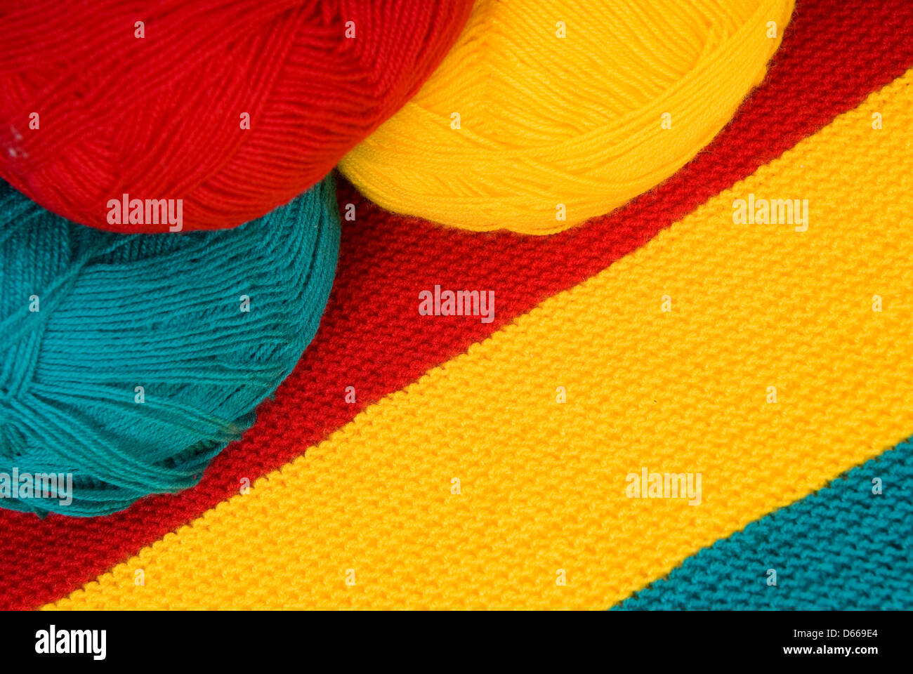 woolen needlework with three hank as background Stock Photo - Alamy