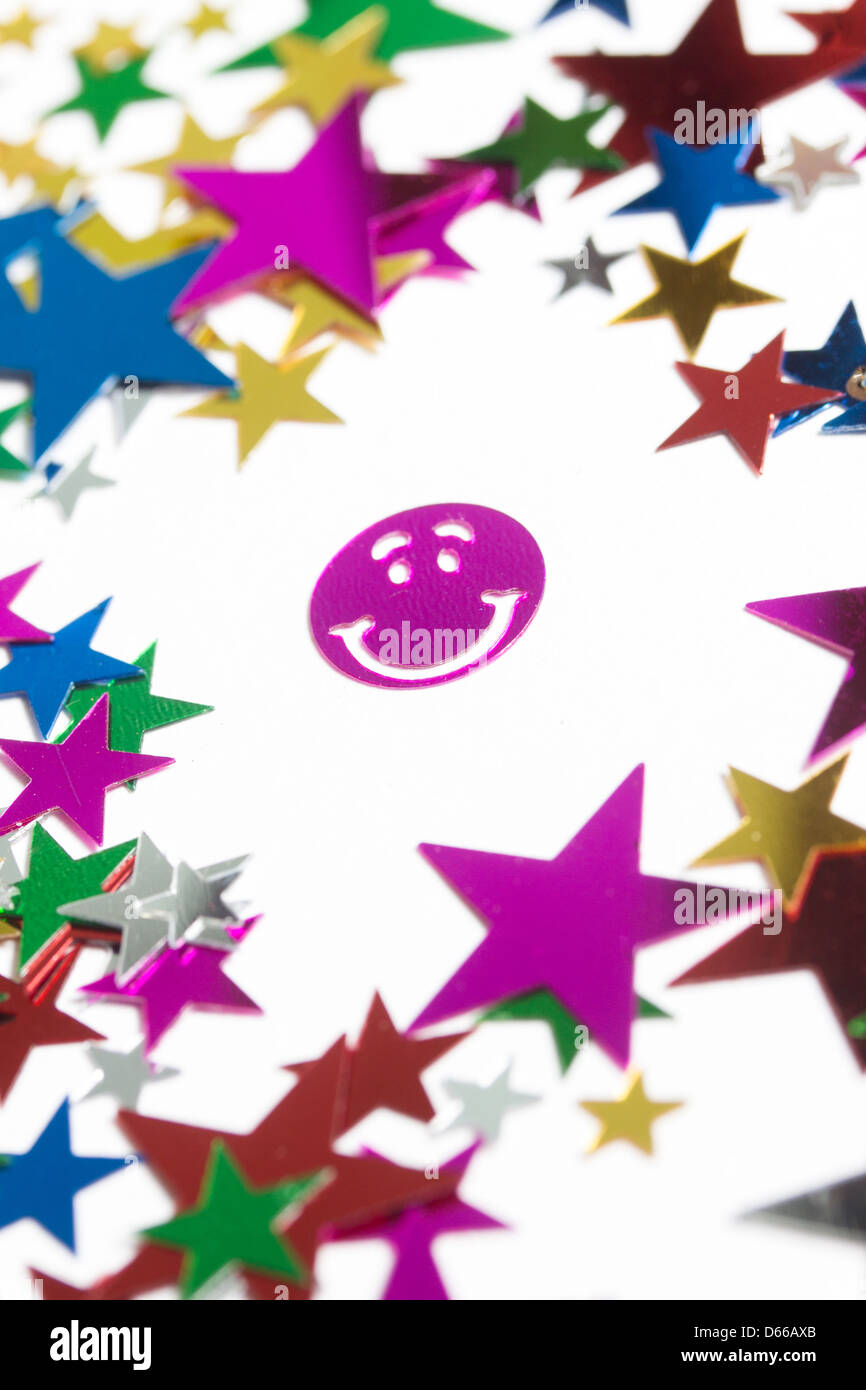 a colored shiny stars background with smiley face Stock Photo - Alamy