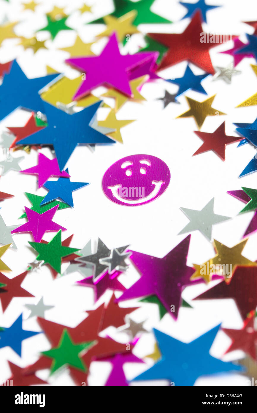 a colored shiny stars background with smiley face Stock Photo - Alamy