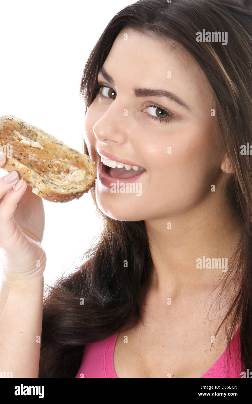 Woman eating dark bread hi-res stock photography and images - Alamy