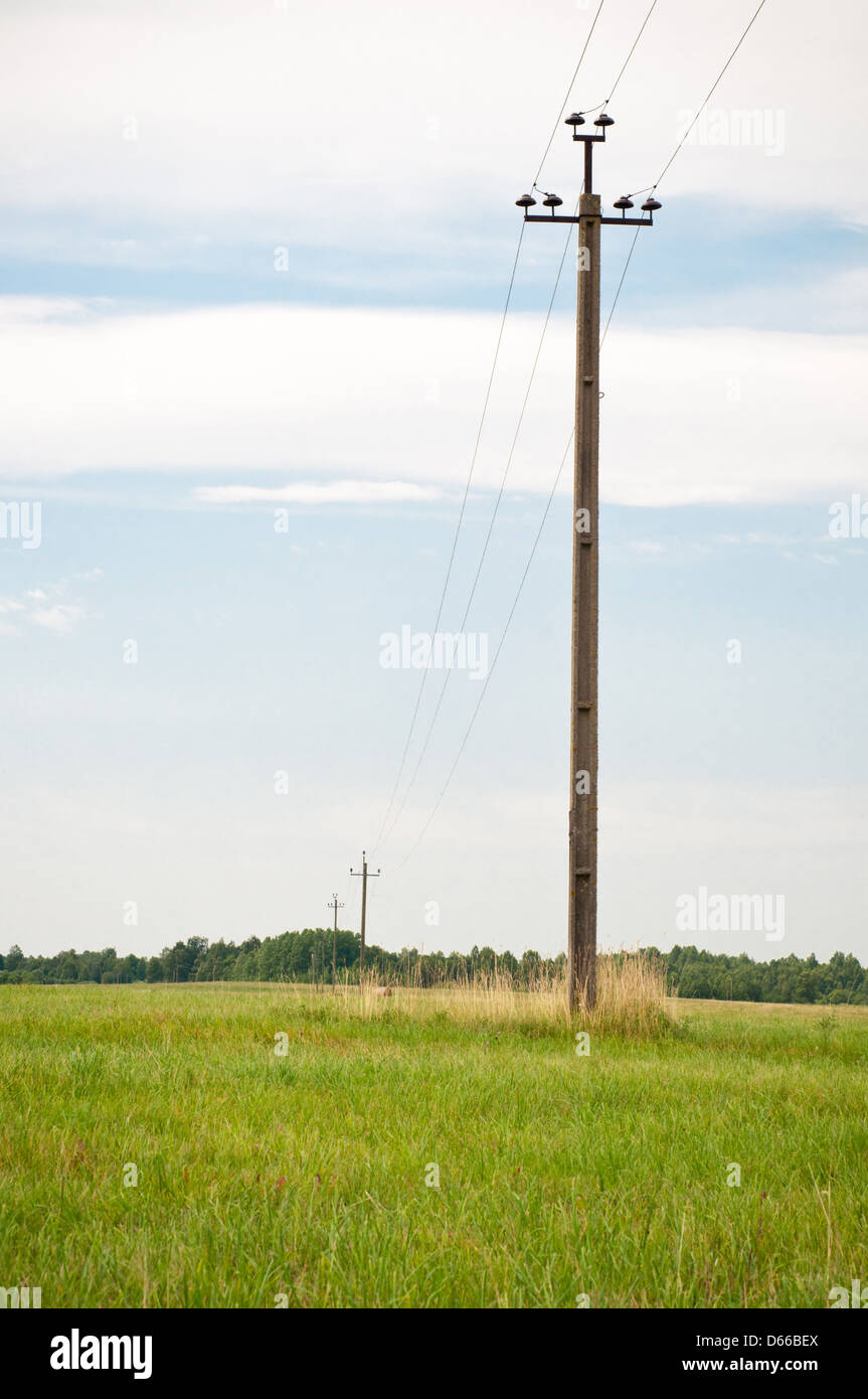 Shot of electric pole, countryside landscape, summer Stock Photo - Alamy