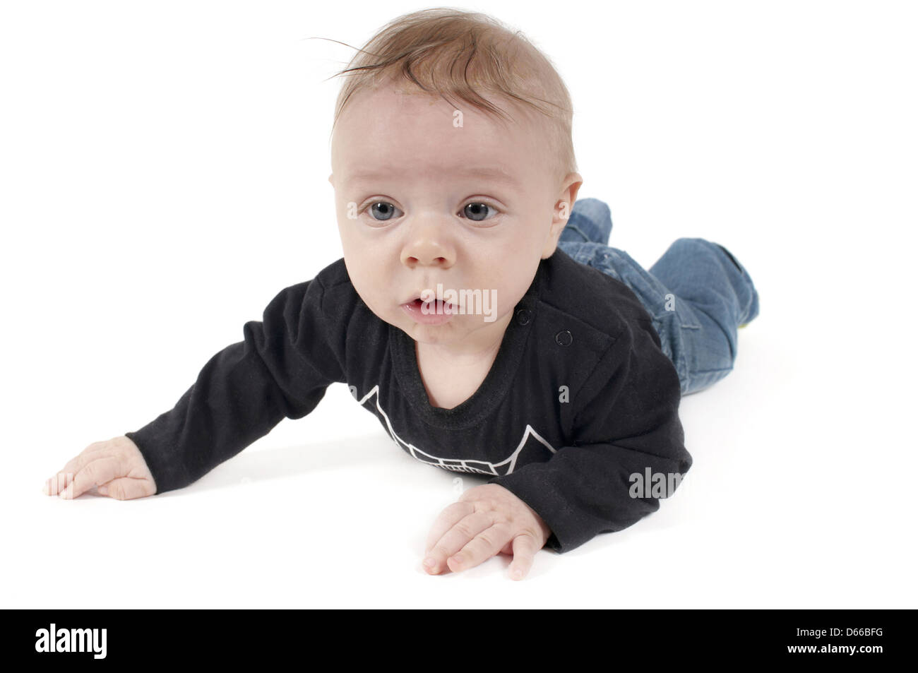 Shot of little baby lying on white background Stock Photo - Alamy