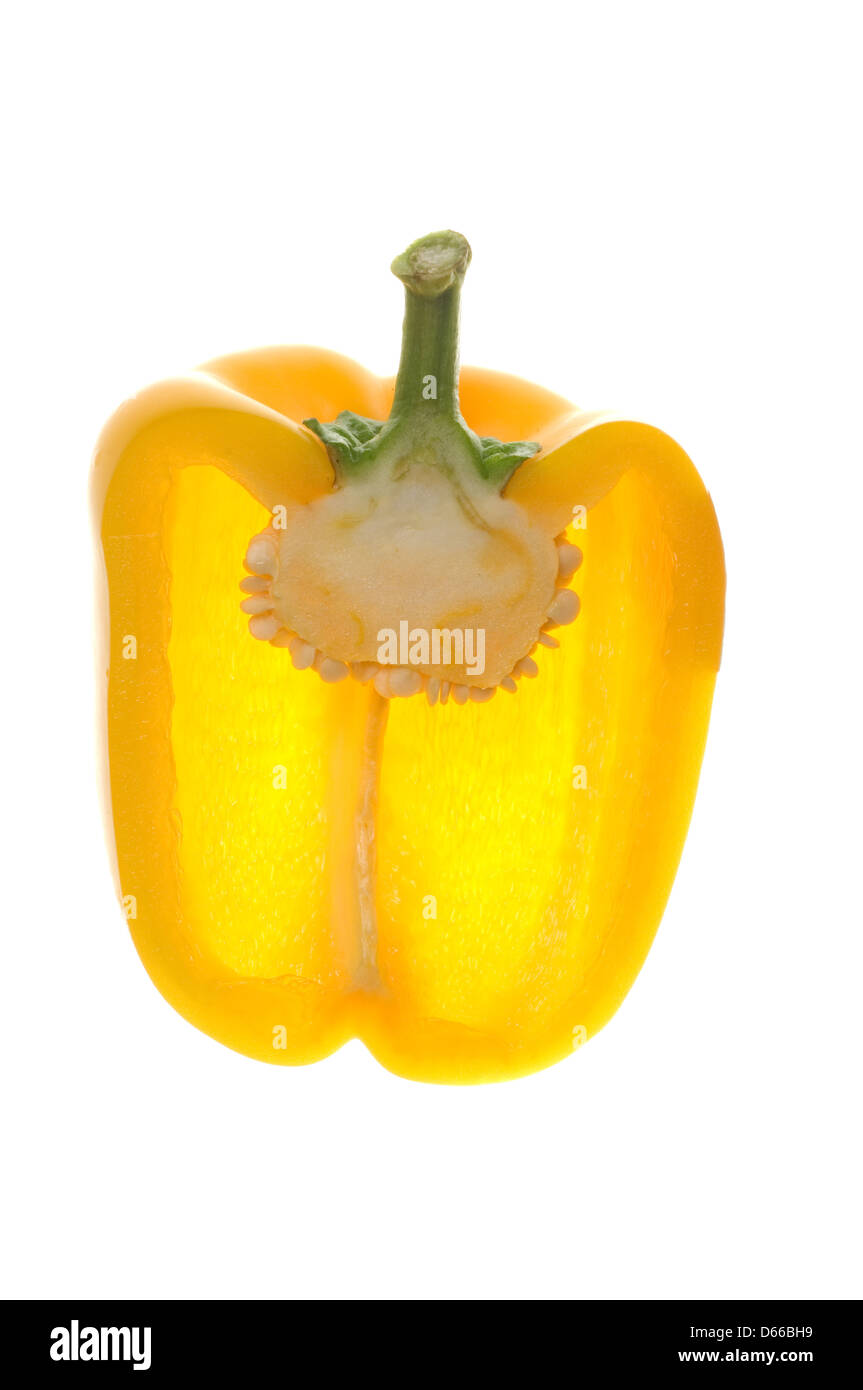 Yellow bell pepper cut open, back lit Stock Photo - Alamy