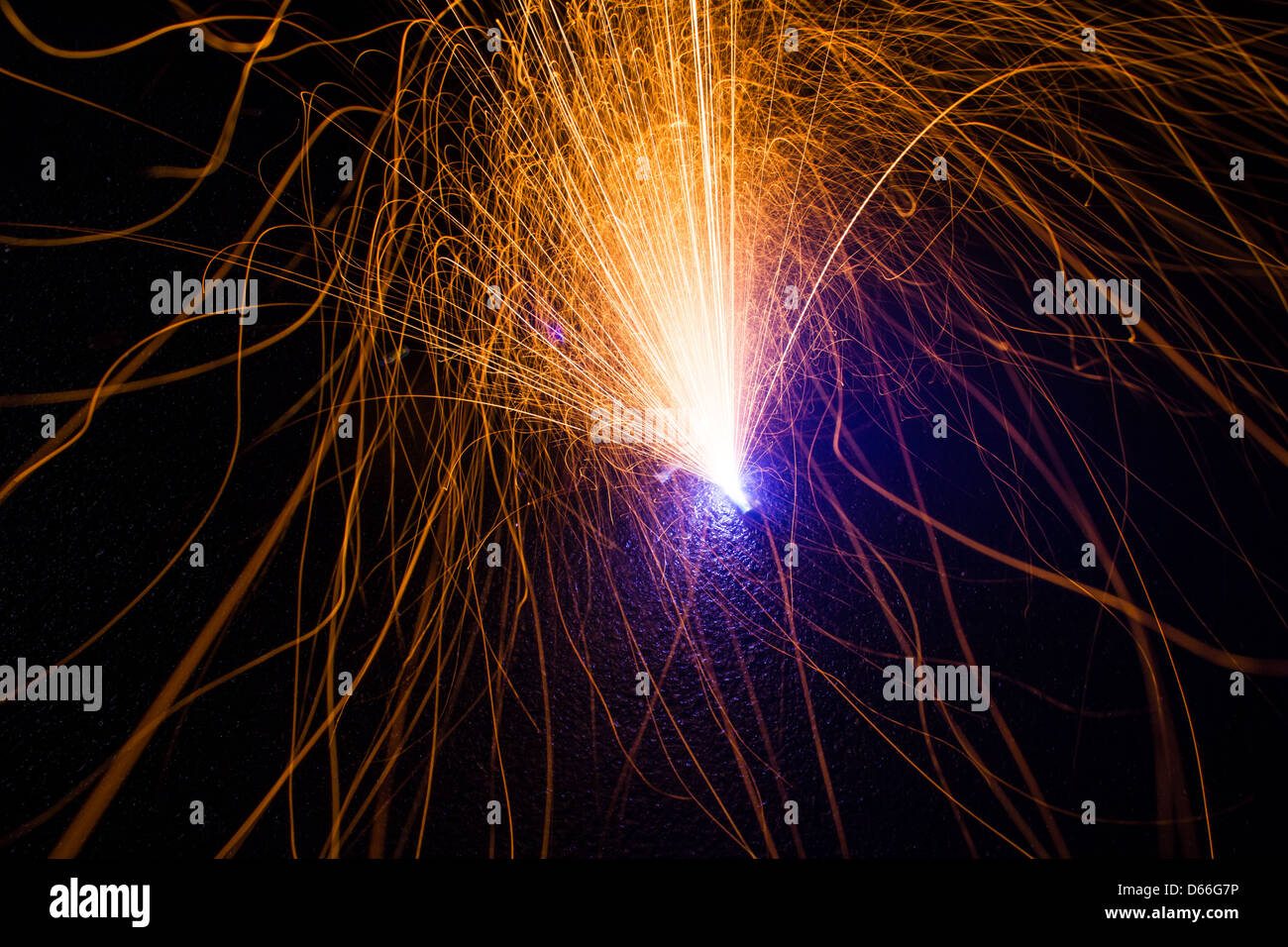 a little bright firework on the ground Stock Photo - Alamy