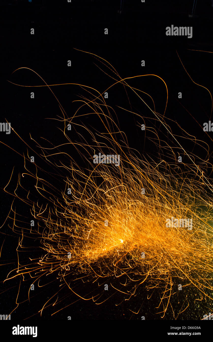 a little bright firework on the ground Stock Photo - Alamy