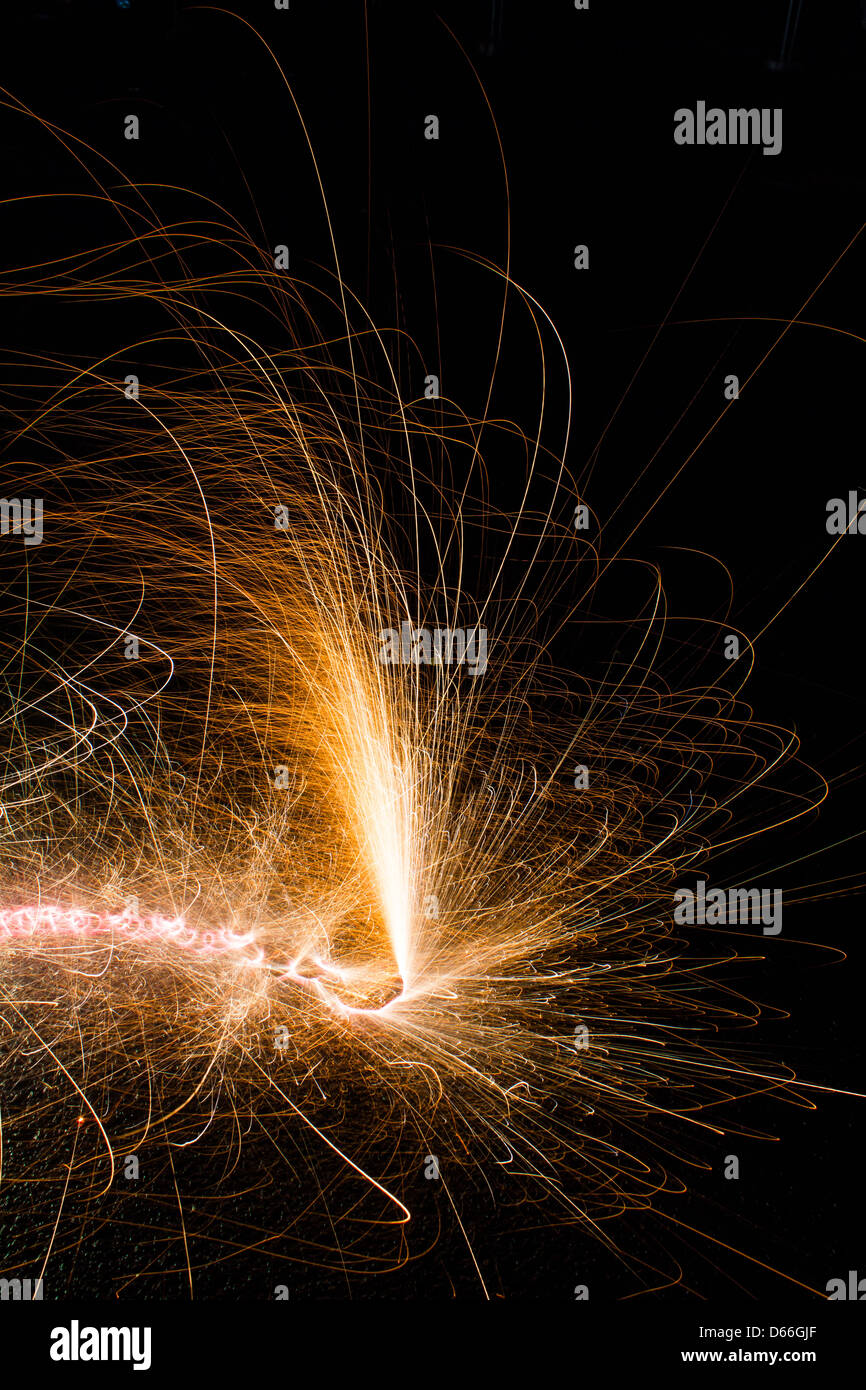 a little bright firework on the ground Stock Photo - Alamy