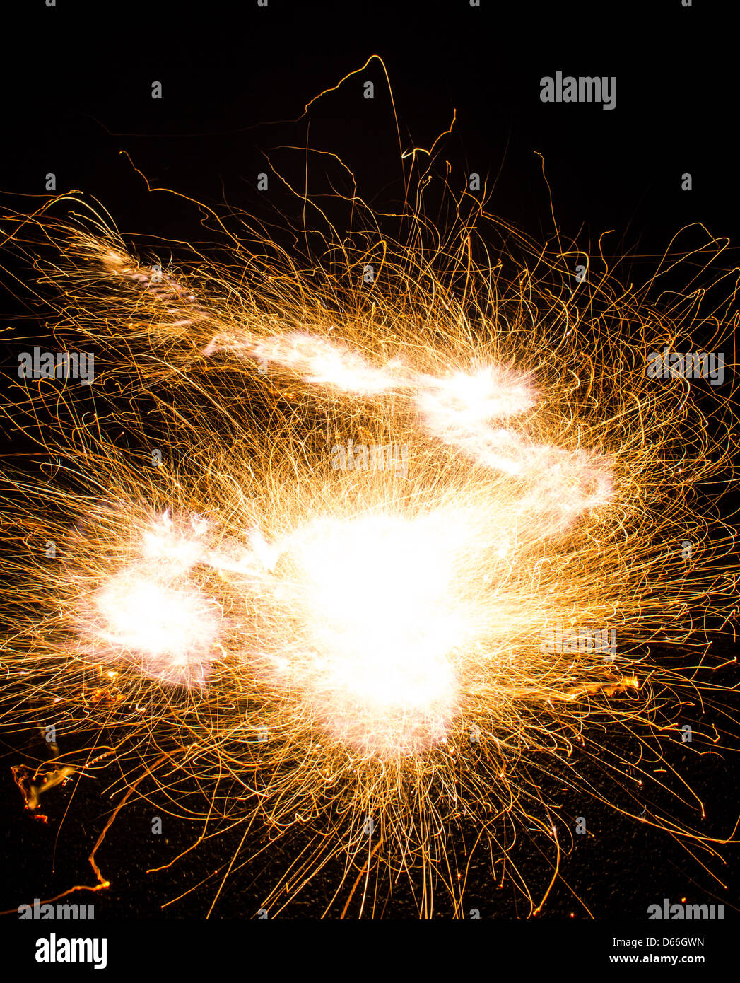 a little bright firework on the ground Stock Photo - Alamy
