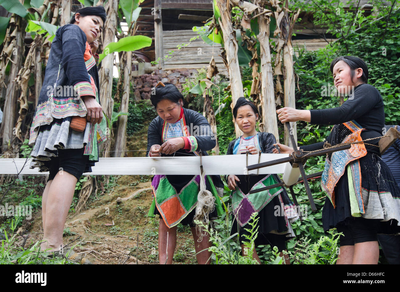 Congjiang Basha Miao Village Women straining home-woven fabric Stock ...
