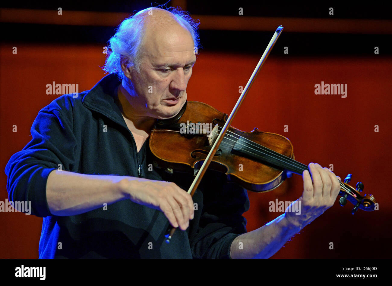Dutch singer Herman van Veen rehearses with a violin on a stage of the ...