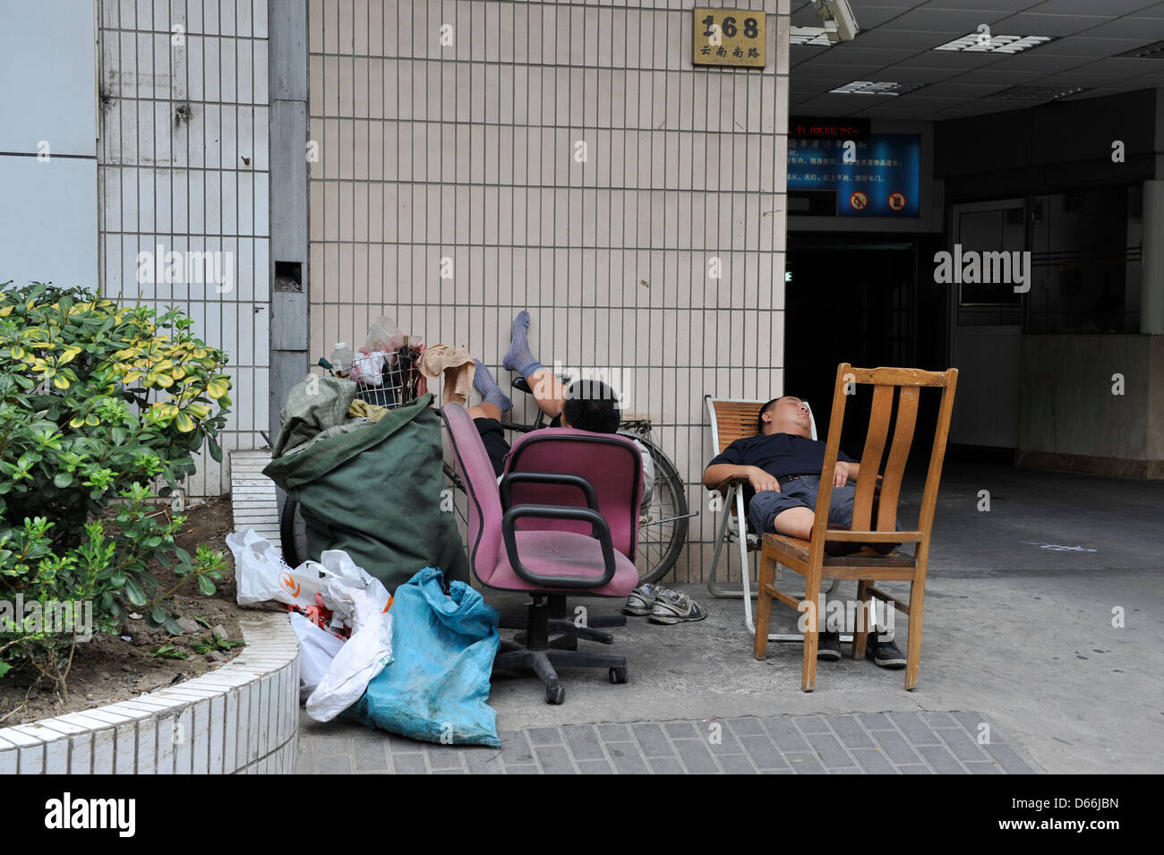 Sleeping workers hi-res stock photography and images - Alamy
