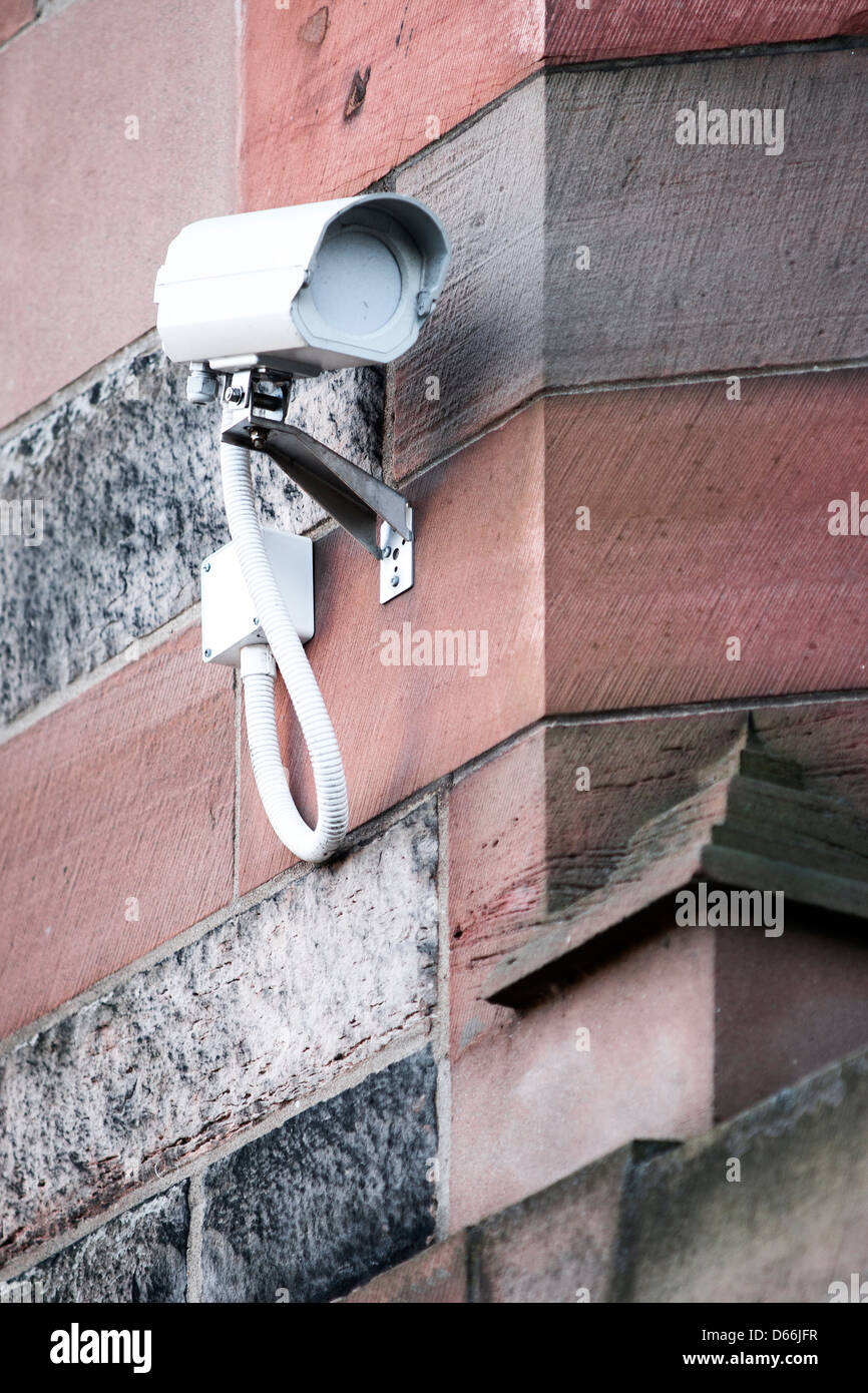 Decoy CCTV on the wall Stock Photo - Alamy