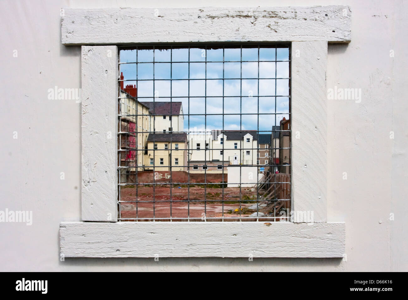 View of houses through a window Stock Photo - Alamy