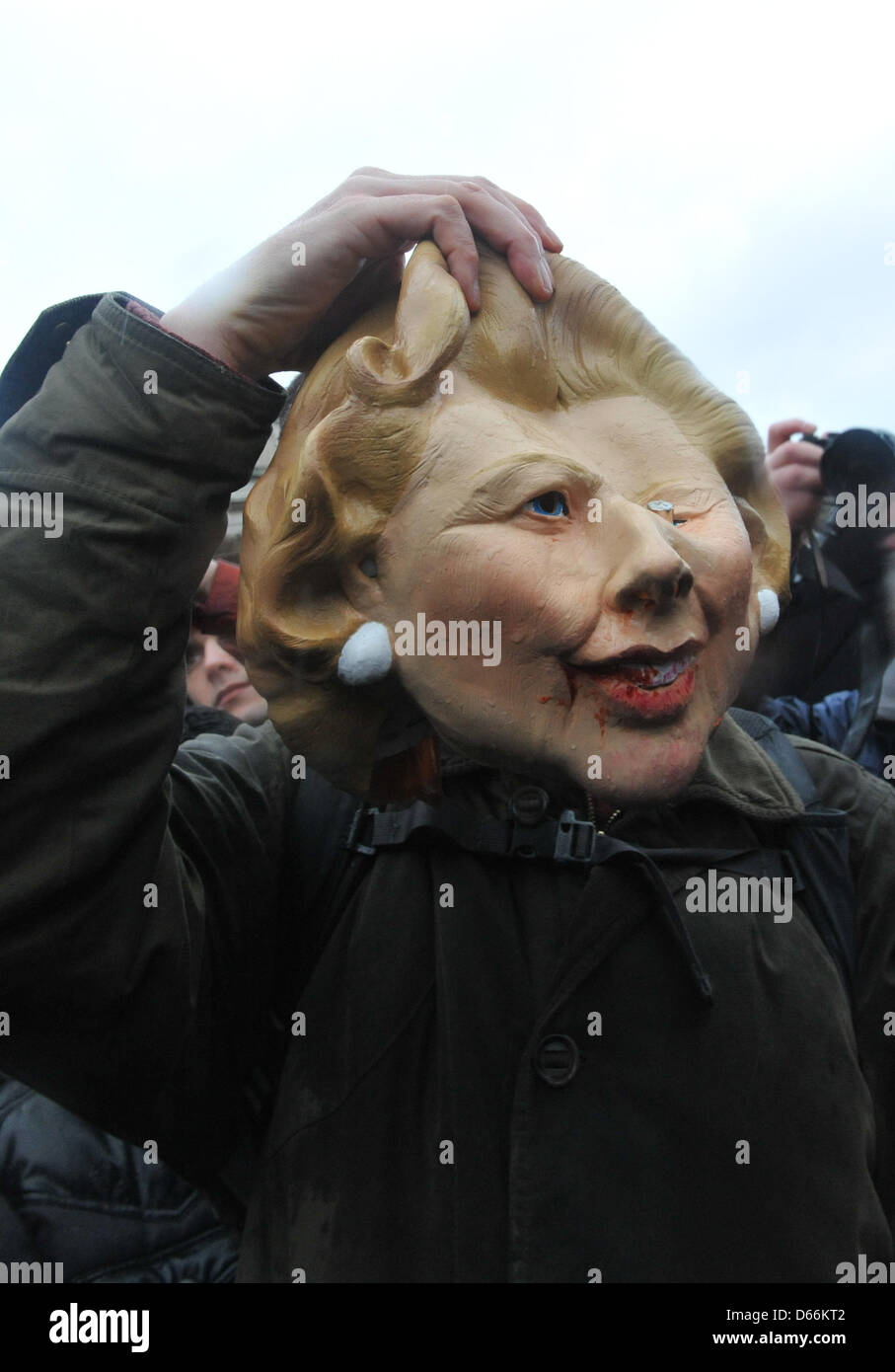 Trafalgar Square, London, UK. 13th April 2013. A Baroness Thatcher mask ...