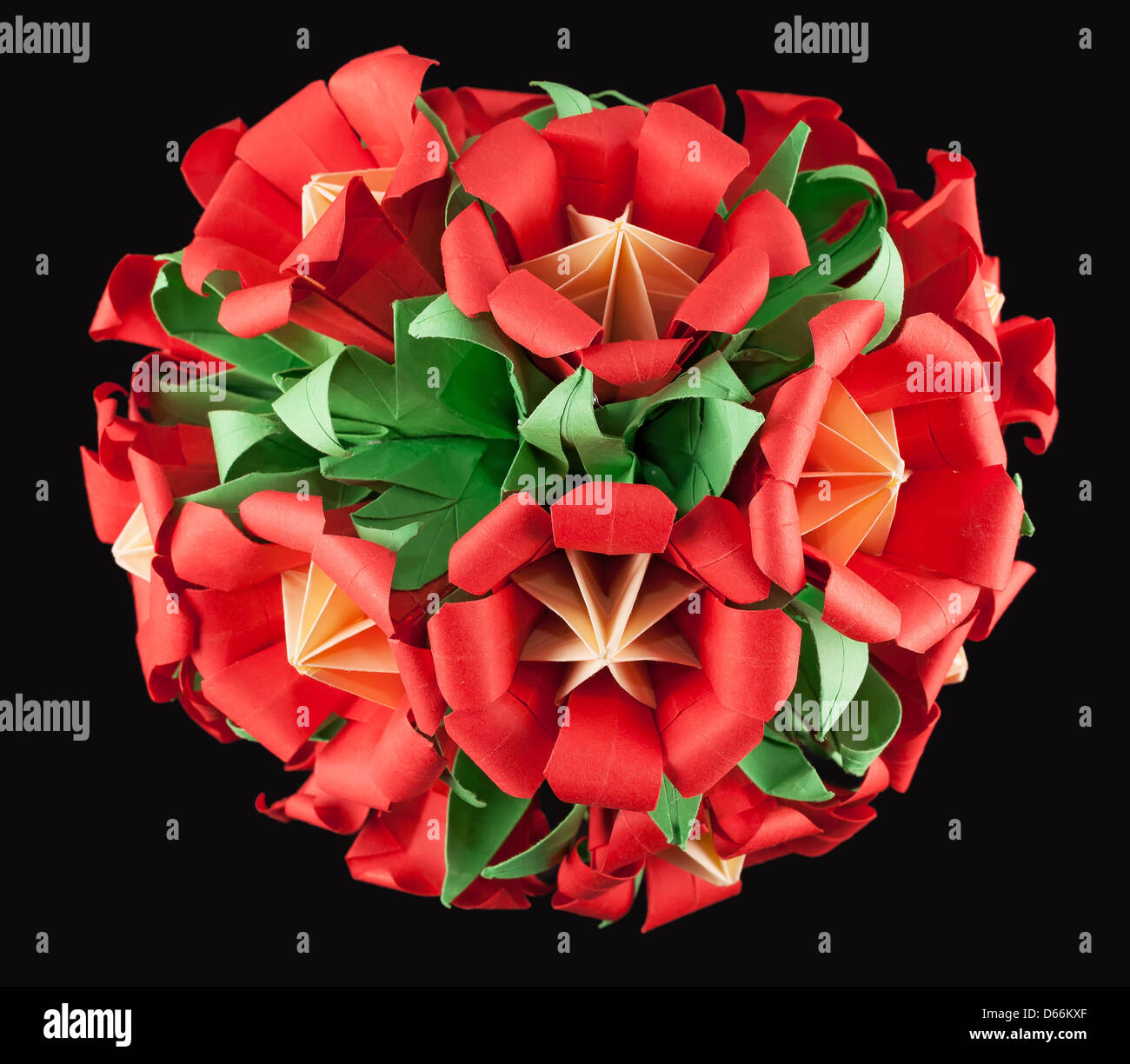 Red green paper origami kusudama isolated on black Stock Photo - Alamy