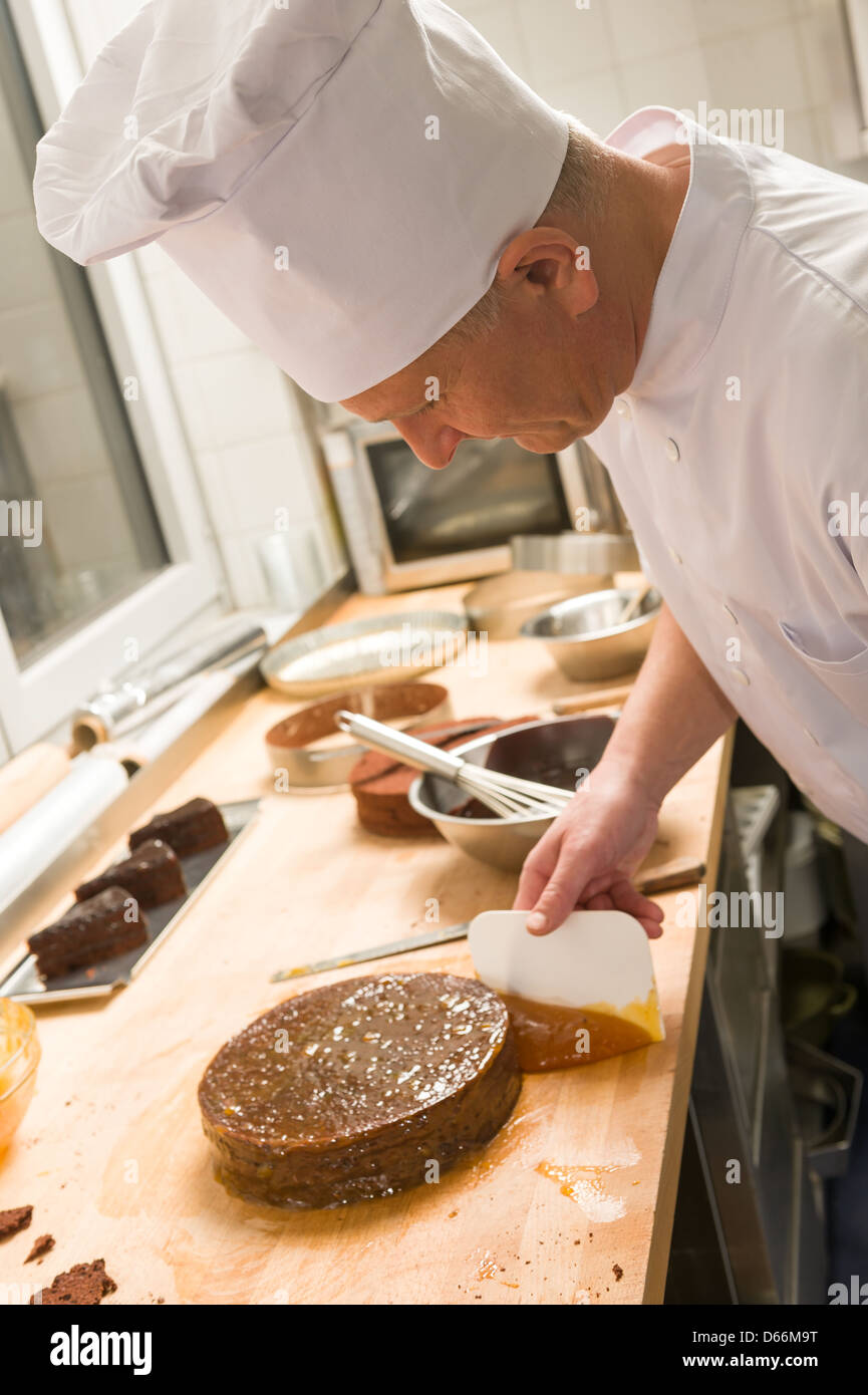 Male making cake hi-res stock photography and images - Alamy
