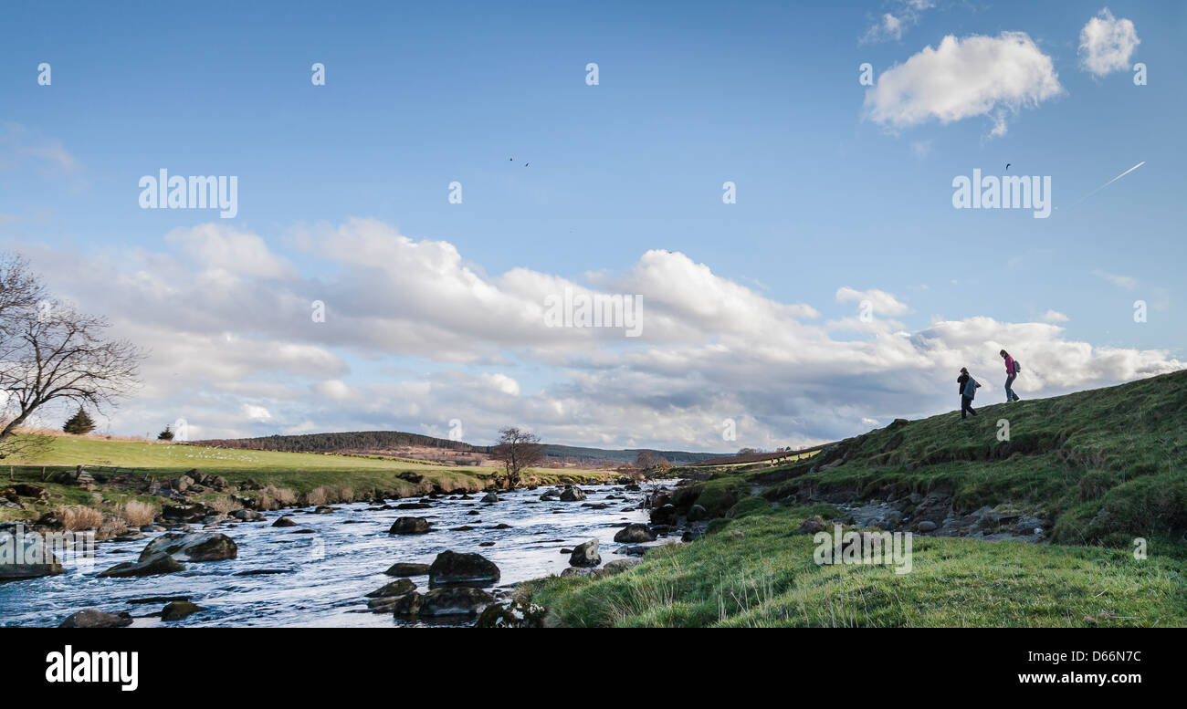 Hikers walking along the River Deveron in Aberdeenshire, Scotland Stock ...