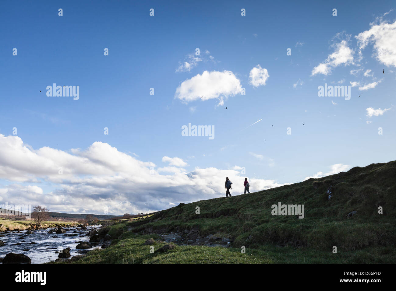 Hikers walking along the River Deveron in Aberdeenshire, Scotland Stock ...