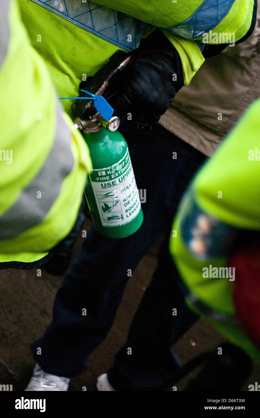 Police officer fire extinguisher hi-res stock photography and images ...