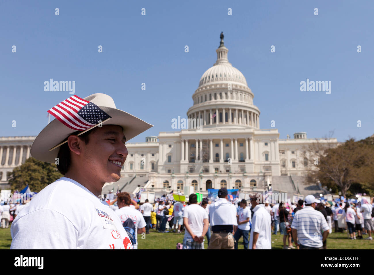 Latino man in front of the US Capitol building during the immigration ...
