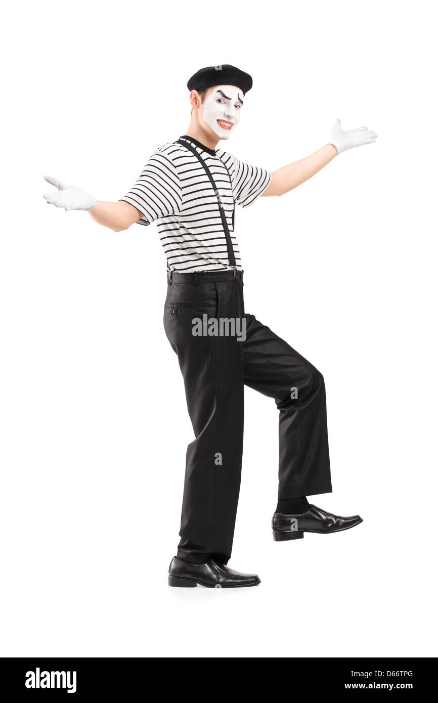 Full length portrait of a mime dancer gesturing with hands, isolated on ...