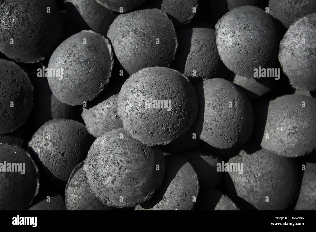 Briquettes from olive stones sit in a grill in Bodenheim, Germany, 07 ...