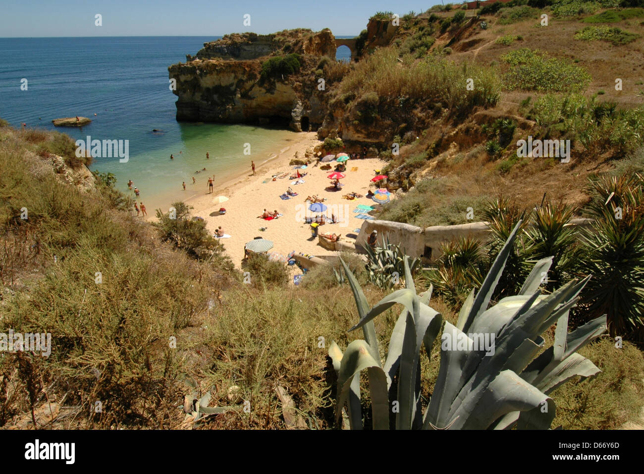 View of Praia da Batata Beach set amidst cliffs in the town of Lagos in ...