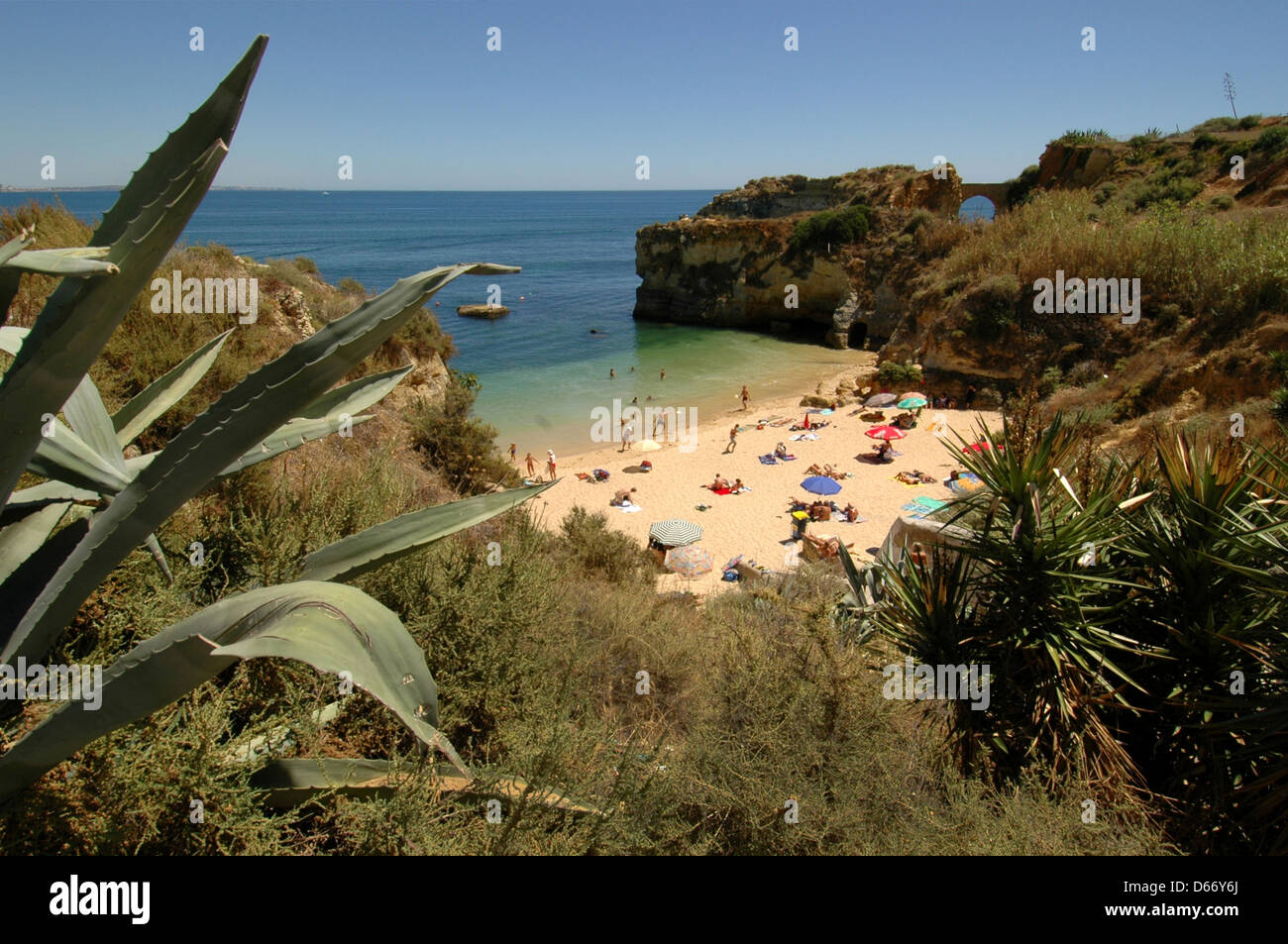 View of Praia da Batata Beach set amidst cliffs in the town of Lagos in ...