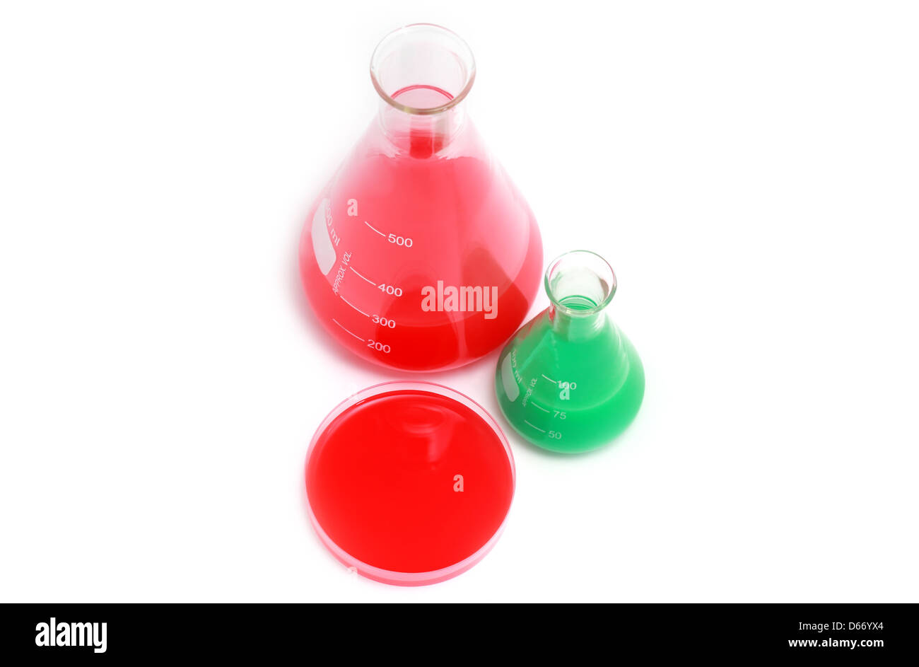 laboratory flasks with chemical solutions over white background Stock ...