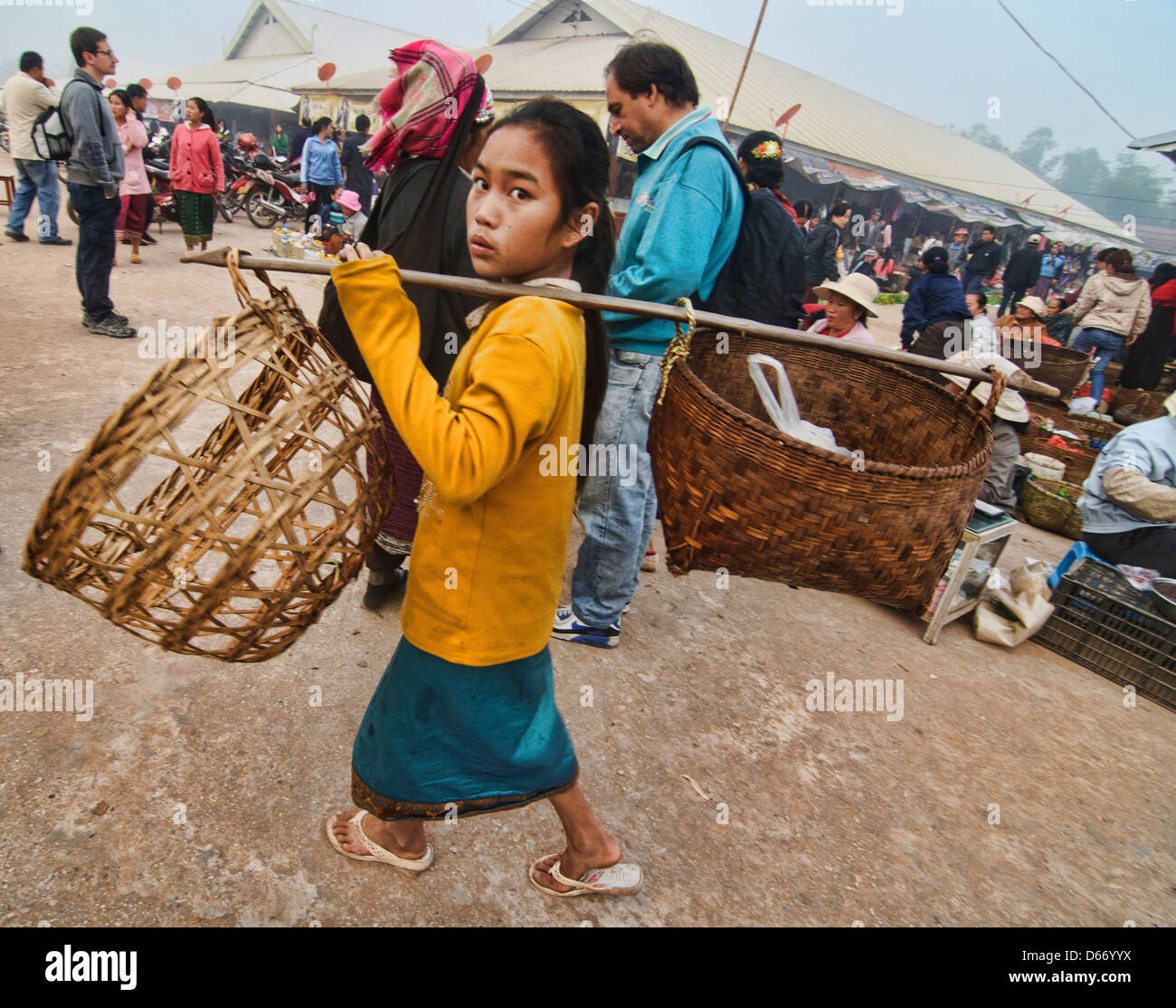 girl on her way to the morning market, Muang Singh, Laos Stock Photo ...