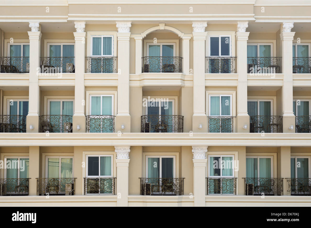 facade of the building in a colonial style, with wrought balconies ...
