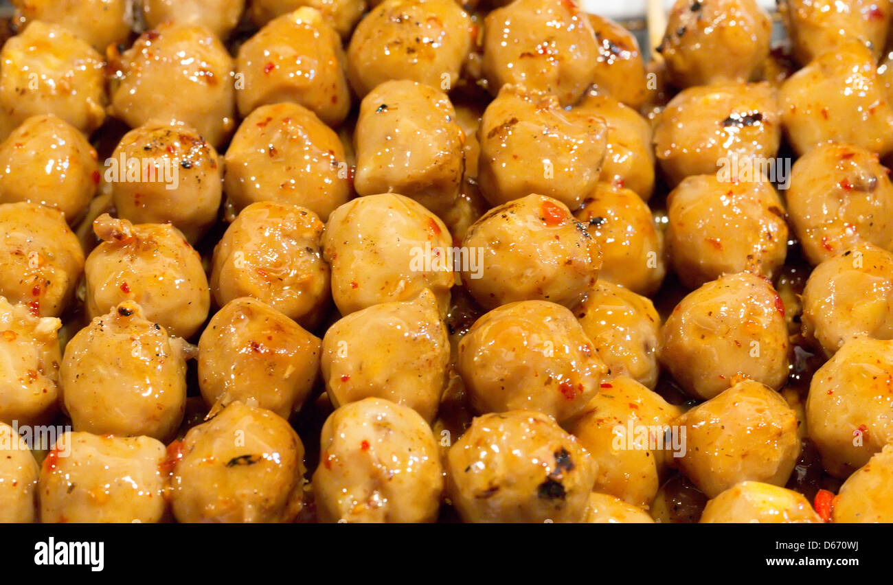 round raw kebabs on the market Thailand Stock Photo - Alamy