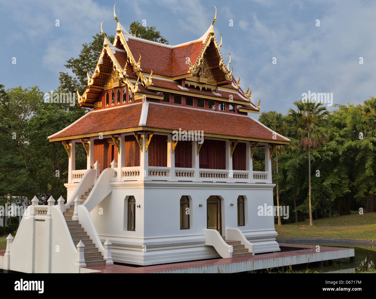beautiful little Thai temple in the forest setting sun Stock Photo - Alamy