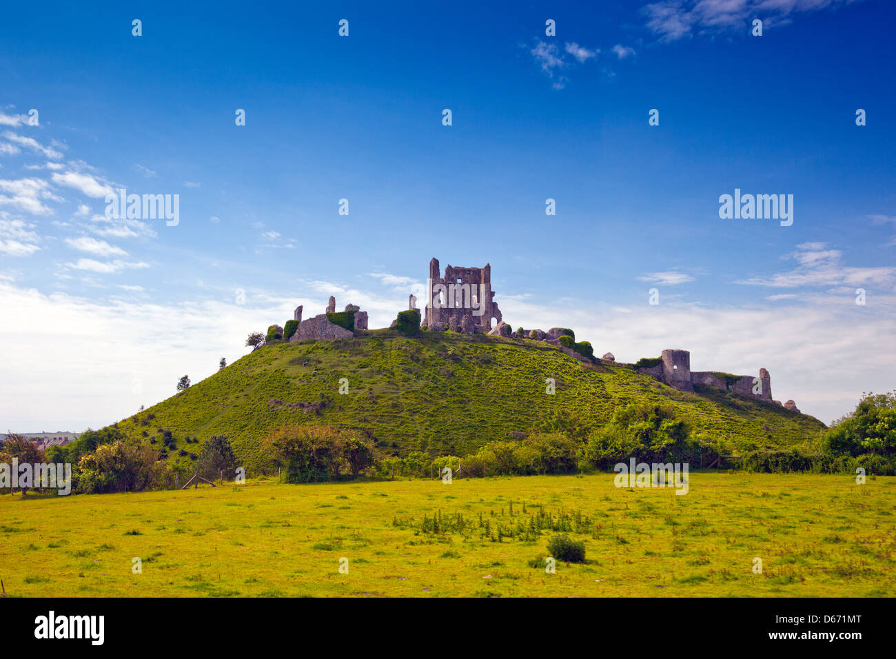 Corfe Castle ruins as seen from a passing train on the Swanage Railway ...
