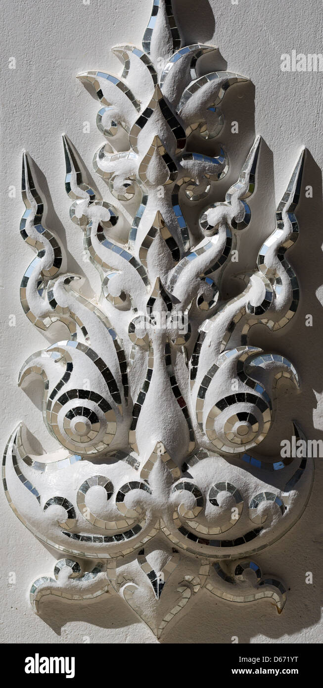 Asian sculpture of the deity face close-up of the White Temple in ...