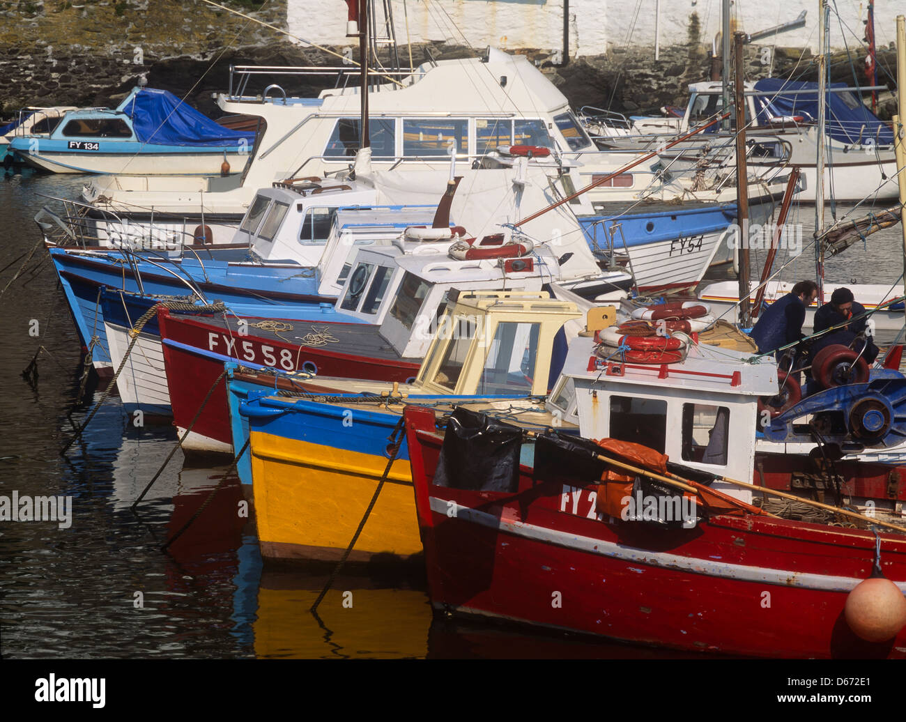 Fishing boats in Polperro harbour, Cornwall, England Stock Photo - Alamy